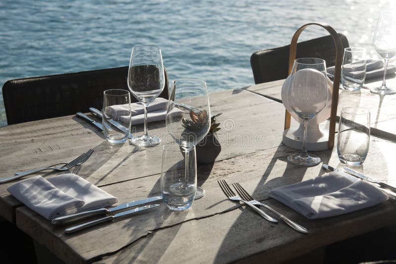 Simple Outdoor Restaurant Table Setting Stock Image - Image of deck ...