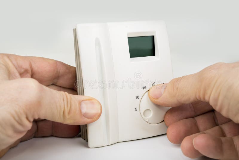 Simple Thermostat for Heating Control on a White Stock Photo - Image of ...