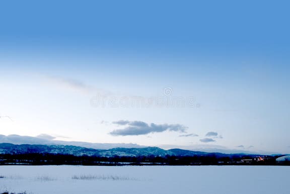 Simple View of Distant Snowy Mountains Stock Photo - Image of twilight ...