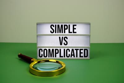 Simple Vs Complicated Text on Light Box on Green Background Stock Image ...