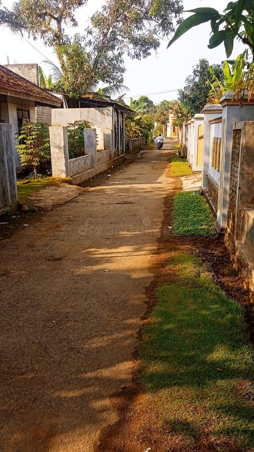 A Simple Walk in the Village with Peaceful Housing Surroundings Stock ...