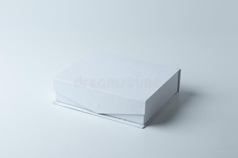 Simple White Box Placed on a Minimalist Surface for Packaging or ...