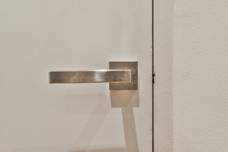 Simple White Door with Metallic Handle Stock Image - Image of metallic ...