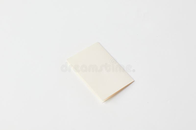 Plain White Notebook Lying Flat on a Light Surface, Showcasing ...