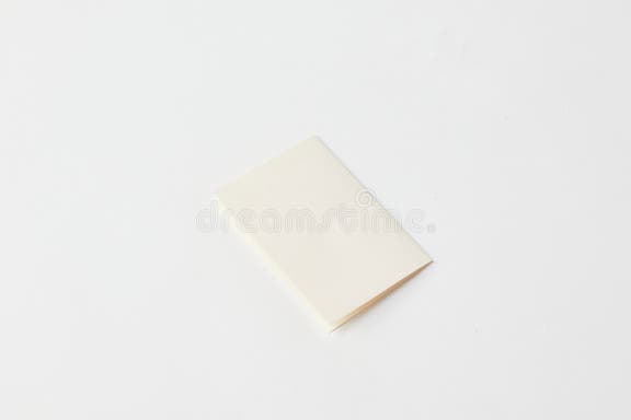 Plain White Notebook Lying Flat on a Light Surface, Showcasing ...