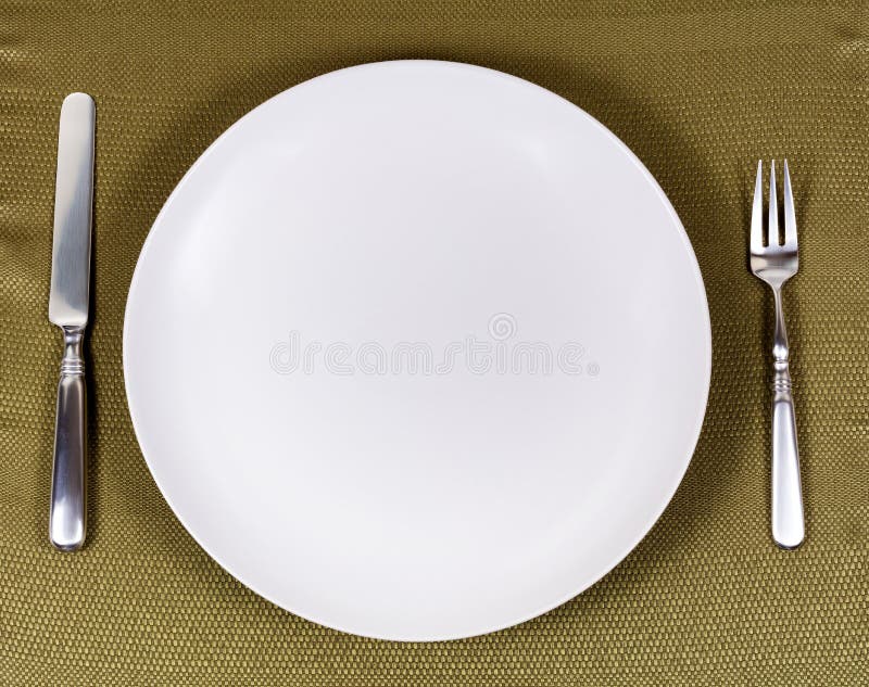 Simple White Plate with Silverware for Dinner Setting on Table C Stock ...