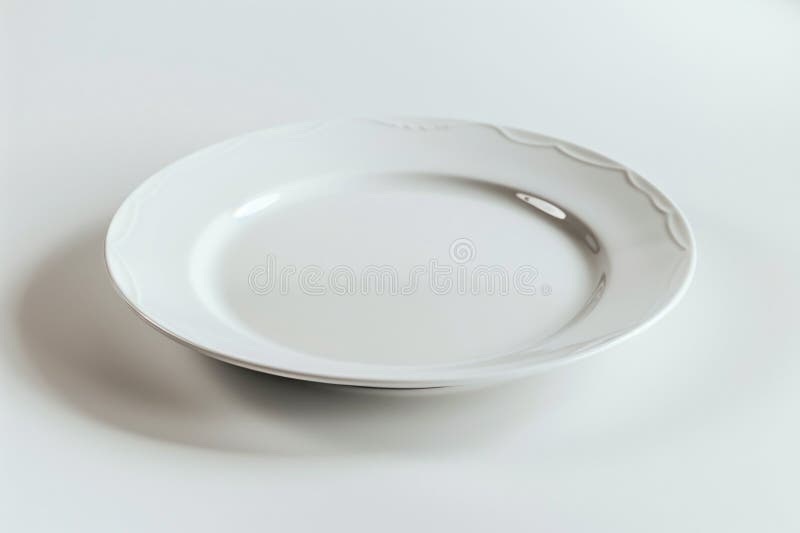 A Simple White Plate on a Table, Versatile for Various Concepts Stock ...