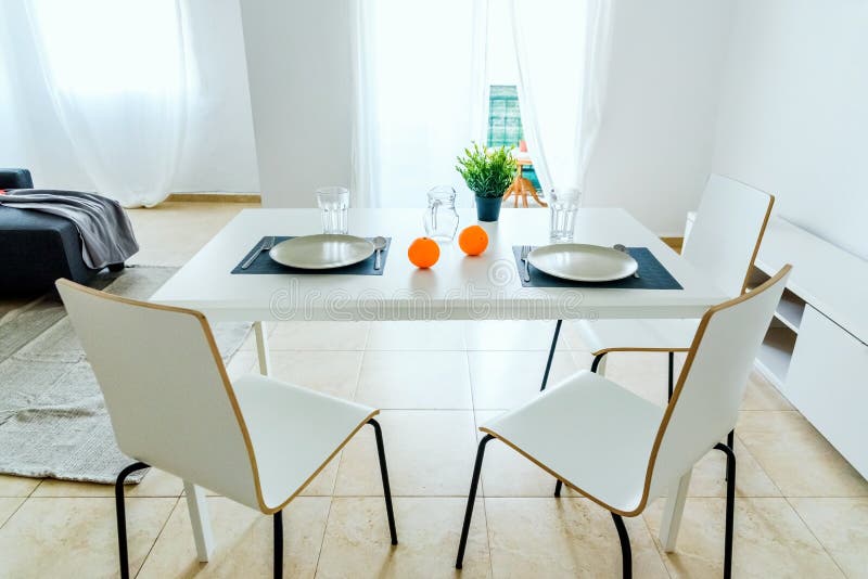Simple White Table in a Very Simple and Bright Minimalist Living Room ...