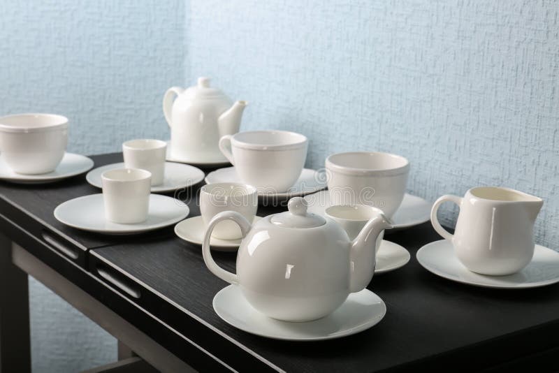 Simple White Tea Set on Black Table Stock Image - Image of ceramic ...
