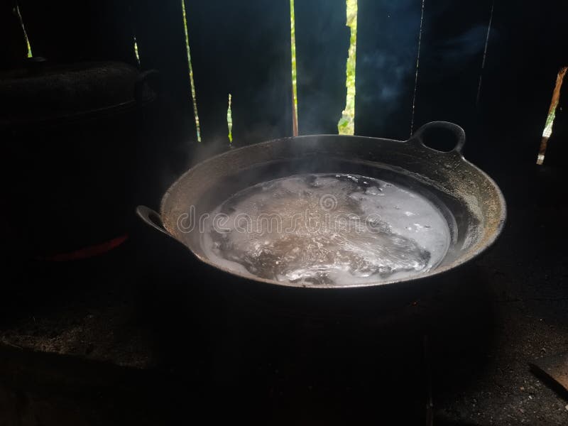 A Simple Wok in a Traditional Kitchen Processing Sap Water from a Palm ...