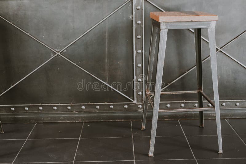 Simple wooden bar stools stock image. Image of brown - 177944253
