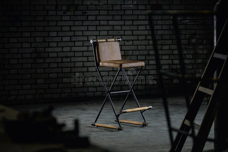 Simple Wooden Barber Chair in a Studio Under the Lights Stock Photo ...