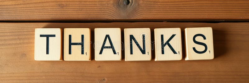 Simple Wooden Blocks Display the Word Thanks on a Rustic Table Surface ...