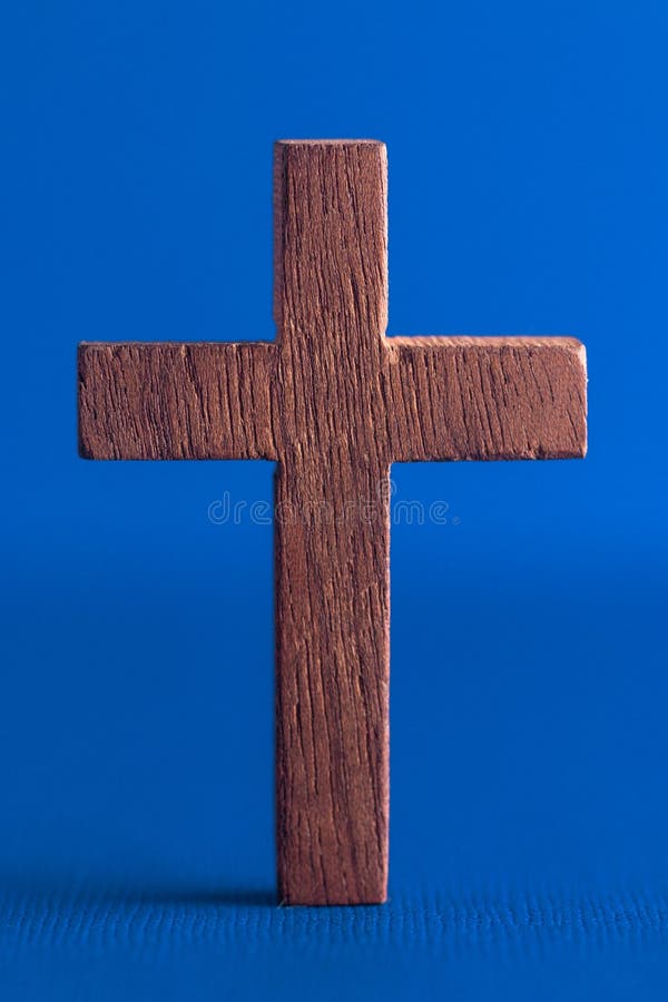 Simple Wooden Cross on a Blue Background Stock Image - Image of ...