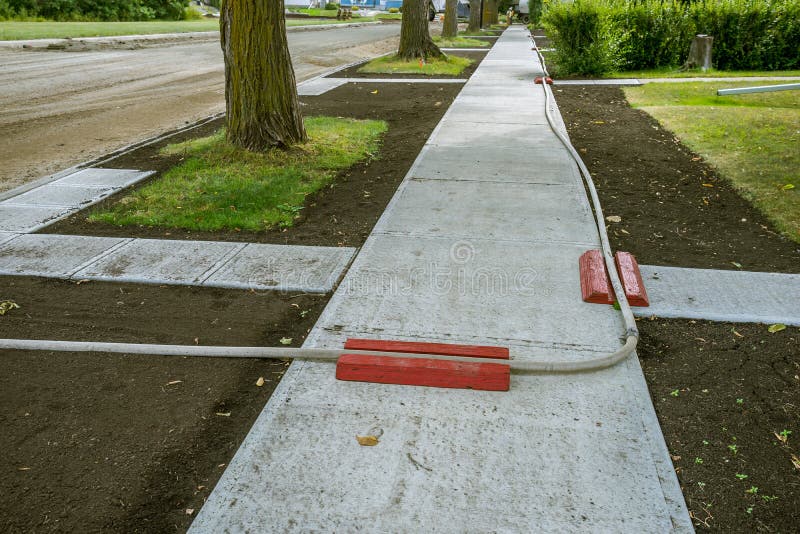 Simple wooden hose ramp stock photo. Image of sidewalk - 45365896