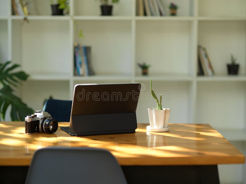 Simple Working Desk with Digital Tablet Computer and Camera Stock Photo ...