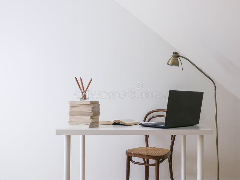 Simple Workspace Interior. Laptop Computer and Open Book Stock Image ...