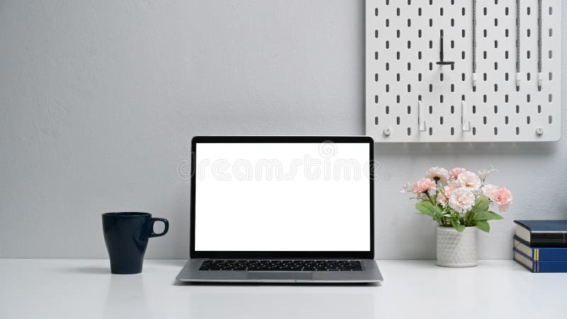 Simple Workspace with Laptop Computer White Table. Stock Image - Image ...