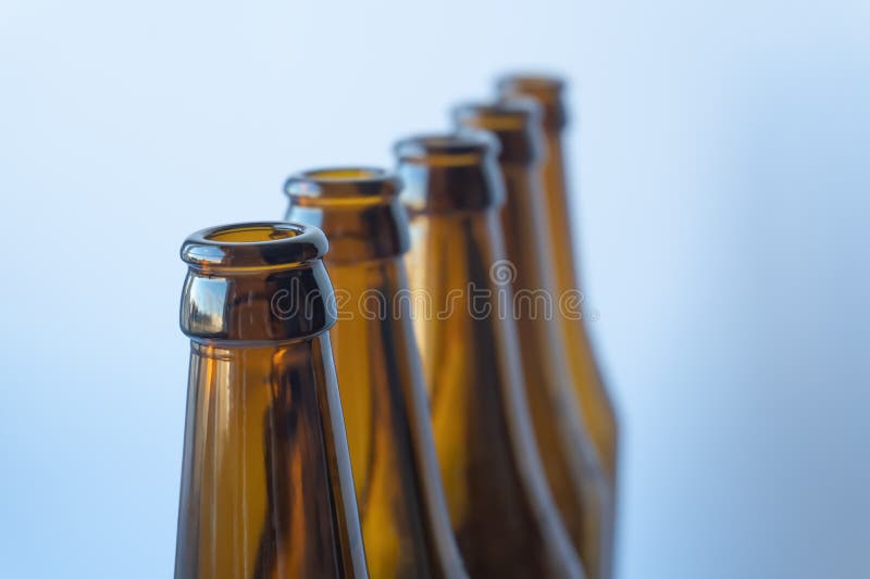 A Close-up of Neatly Arranged Brown Glass Beer Bottles Stock Photo ...