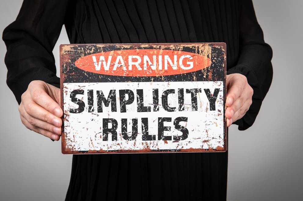 Simplicity Rules. Warning Sign in Woman& X27;s Hands Stock Image - Image of regulation, guidance ...