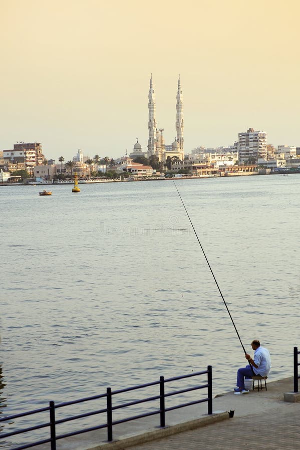 Port Said, Man Fishing at Port Editorial Stock Image - Image of ...