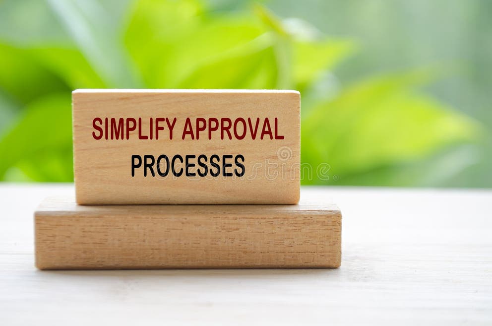 Simplify Approval Processes Text on Wooden Blocks Representing ...