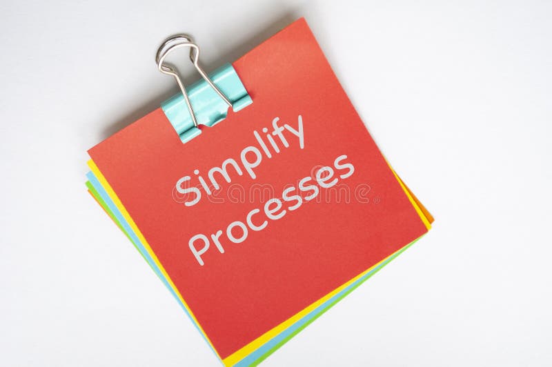 Simplify Processes Text on Red Notepad on White Background Stock Photo ... Simplify Processes Text on Red Notepad on White Background Stock Photo ...