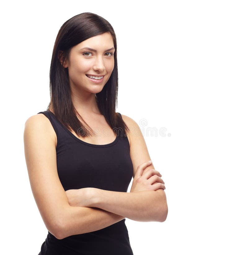 Simply Stunning. a Beautiful Young Woman Crossing Her Arms while ... Simply Stunning. a Beautiful Young Woman Crossing Her Arms while ...