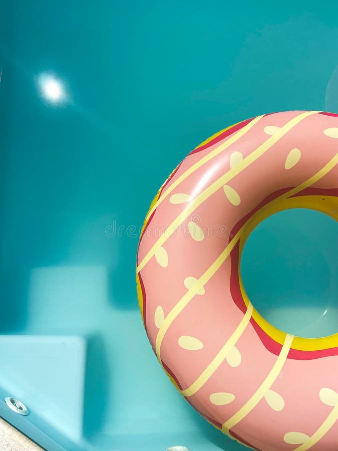 Simpsons Donut Floating in a Pool Stock Photo - Image of floating ...