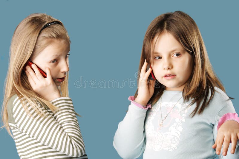 Simultaneously on mobiles stock image. Image of mobile - 9165525