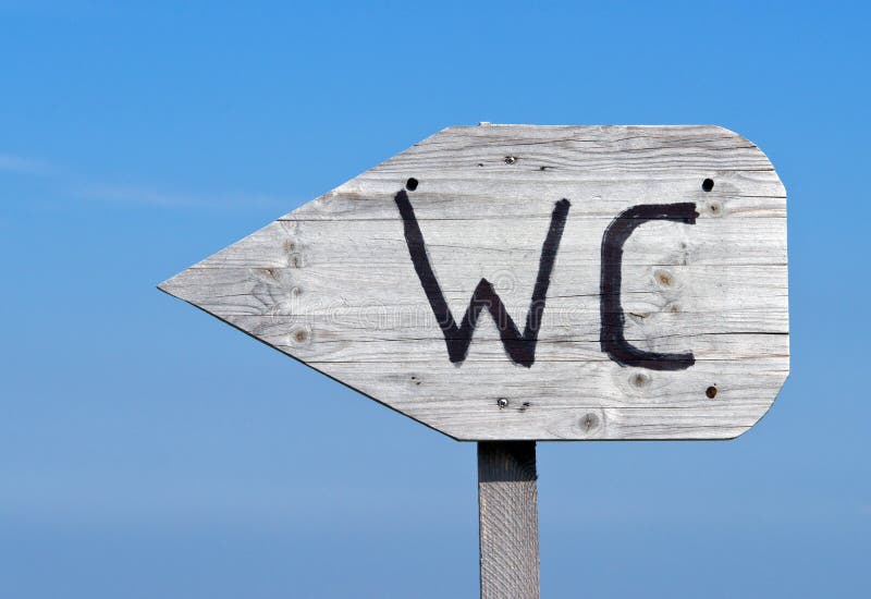 Sinal da seta do WC foto de stock. Imagem de restroom - 31056334