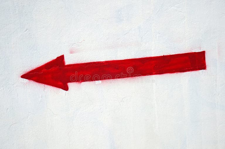 Sinal Vermelho Da Seta Na Parede Imagem de Stock - Imagem de branco ...