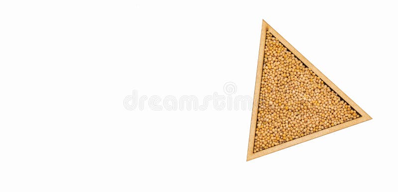 Sinapis Alba - Yellow Mustard Seeds in the Triangular Bowl Stock Photo ...