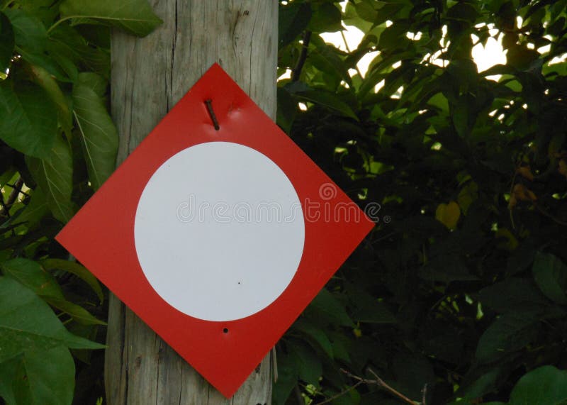 Sing on Red with a White Circle Stock Image - Image of round, attention ...
