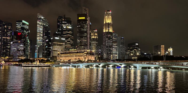 Beautiful Lights at Night from the Buildings with Reflection at the Bay ...