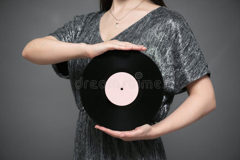 Vinyl record in hands stock photo. Image of label, karaoke - 181660804