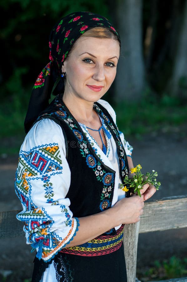 Singer with Flowers in Her Hands Posing at Countryside Stock Image ...