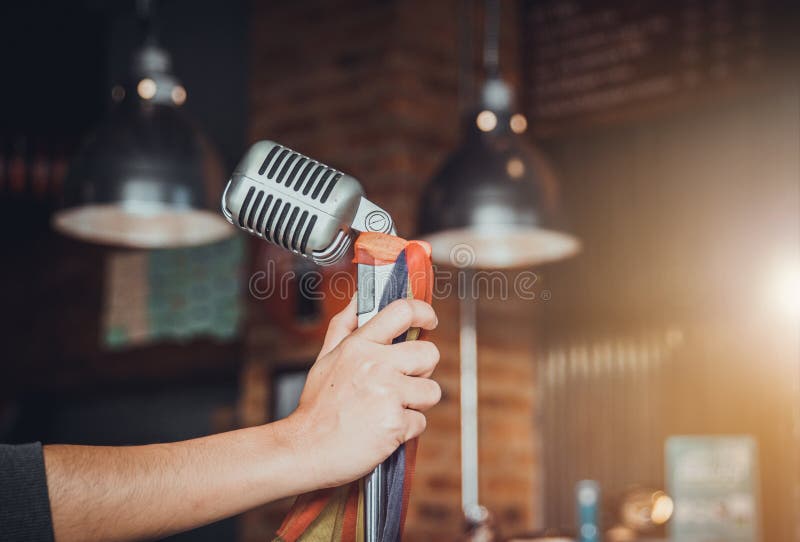 Singer Hands Holding Microphone Stock Photo - Image of musical ...