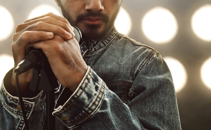 Singer Holding Microphone on Stand Stock Image - Image of media ...