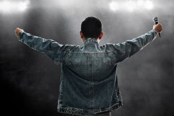 Singer Holding Wireless Microphone on Stage Stock Image - Image of ...