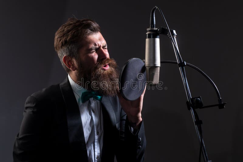 Singer Man Singing with a Music Microphone. Stock Photo - Image of ...