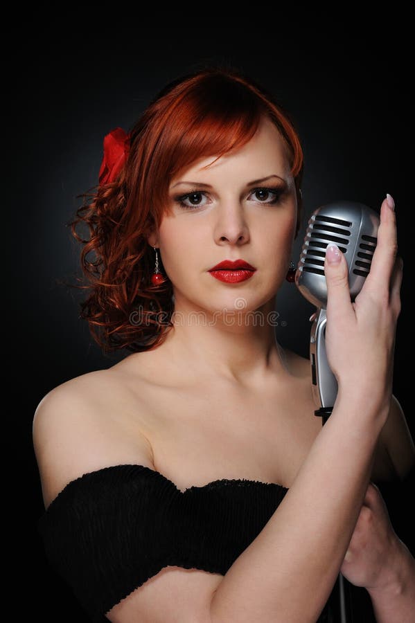 Singer with a microphone stock image. Image of hairs - 15125187