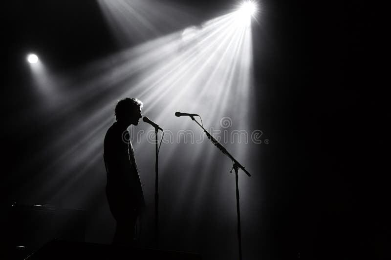 Singer Performing Live on Stage Under Spotlights Stock Photo - Image of ...