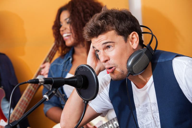 Singer Performing in Recording Studio Stock Image - Image of playing ...