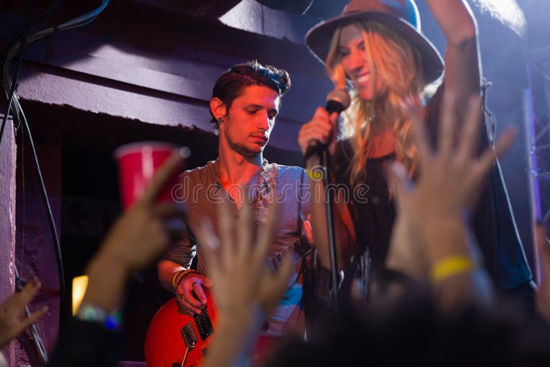 Singer performing on stage stock image. Image of festival - 93236267