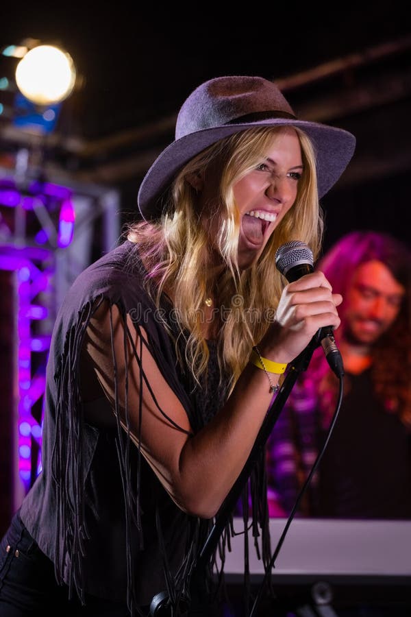 Singer performing on stage stock image. Image of millennial - 93236269