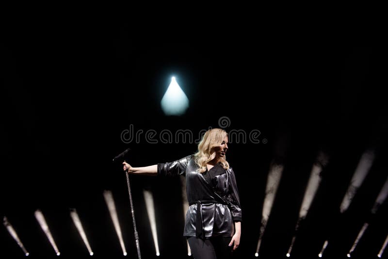 Singer on Scene in the Club. Bright Stage Lighting. Stock Image - Image ...