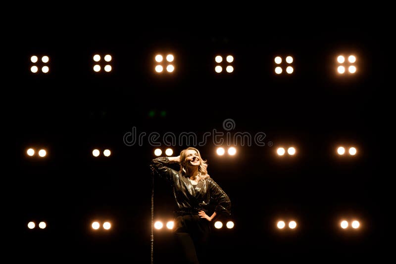 Singer on Scene in the Club. Bright Stage Lighting. Stock Image - Image ...