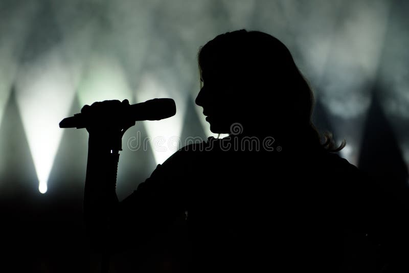 Singer in Silhouette. Close Up Image of Live Singer on Stage Stock ...