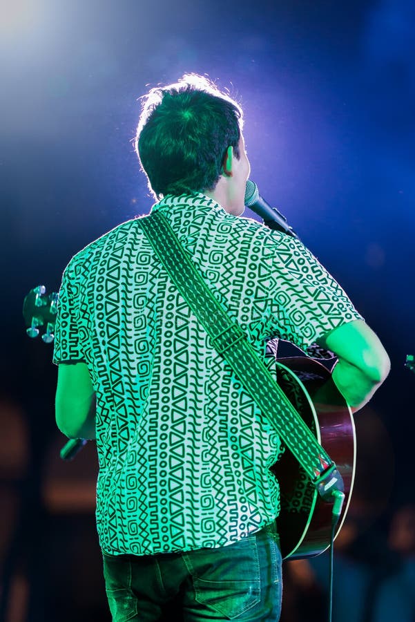 Singer Sing a Song with Guitar Editorial Image - Image of musical ...